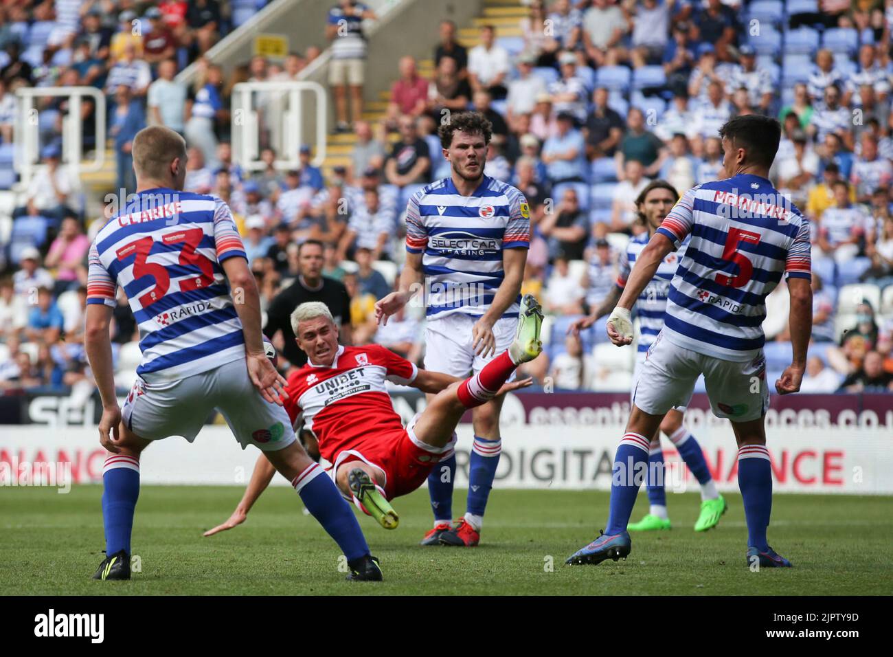 Matthew Hoppe #13 of Middlesbrough goes down under a challenge from Tom ...