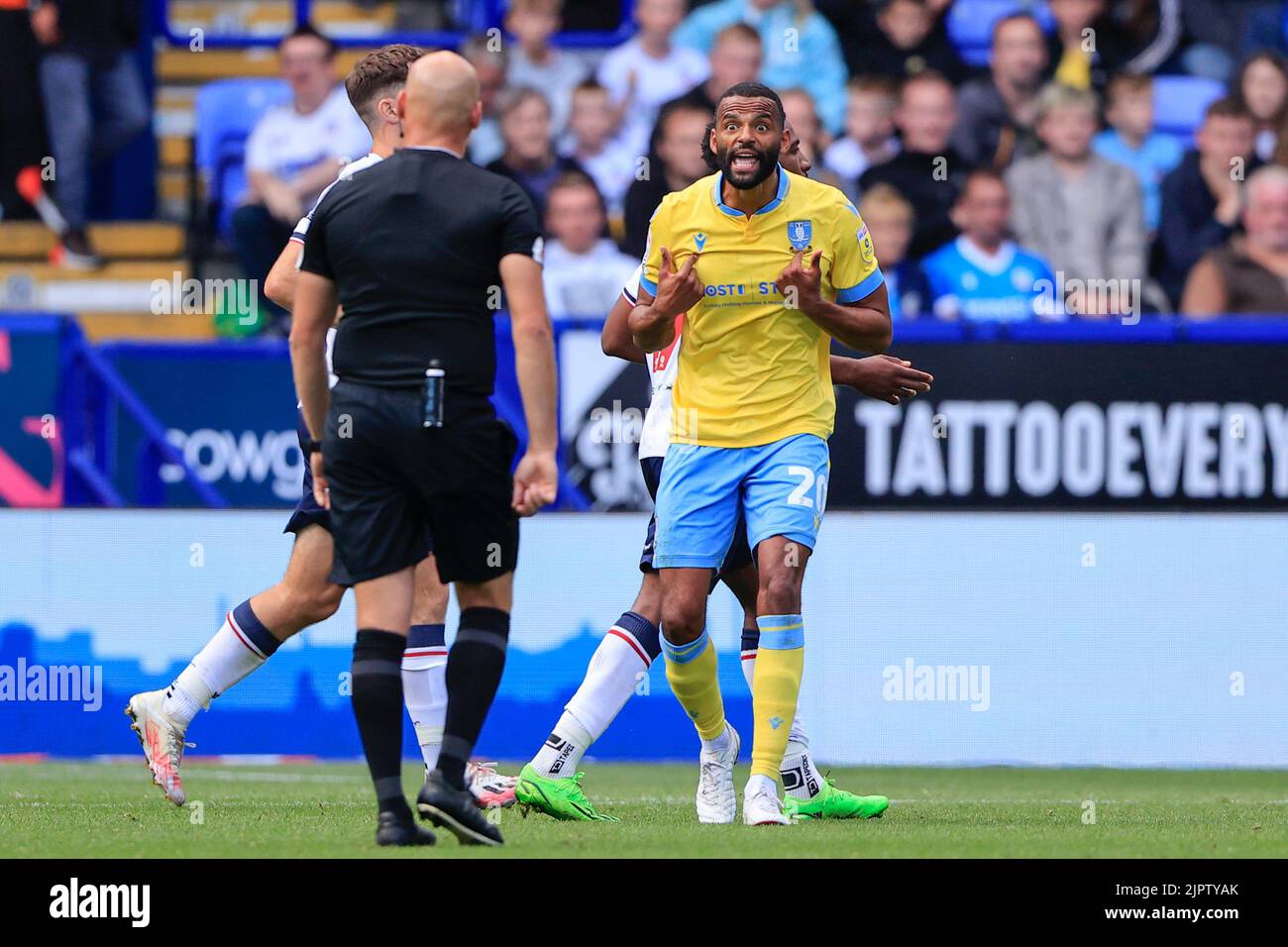 Michael Ihiekwe #20 of Sheffield Wednesday has words with referee ...
