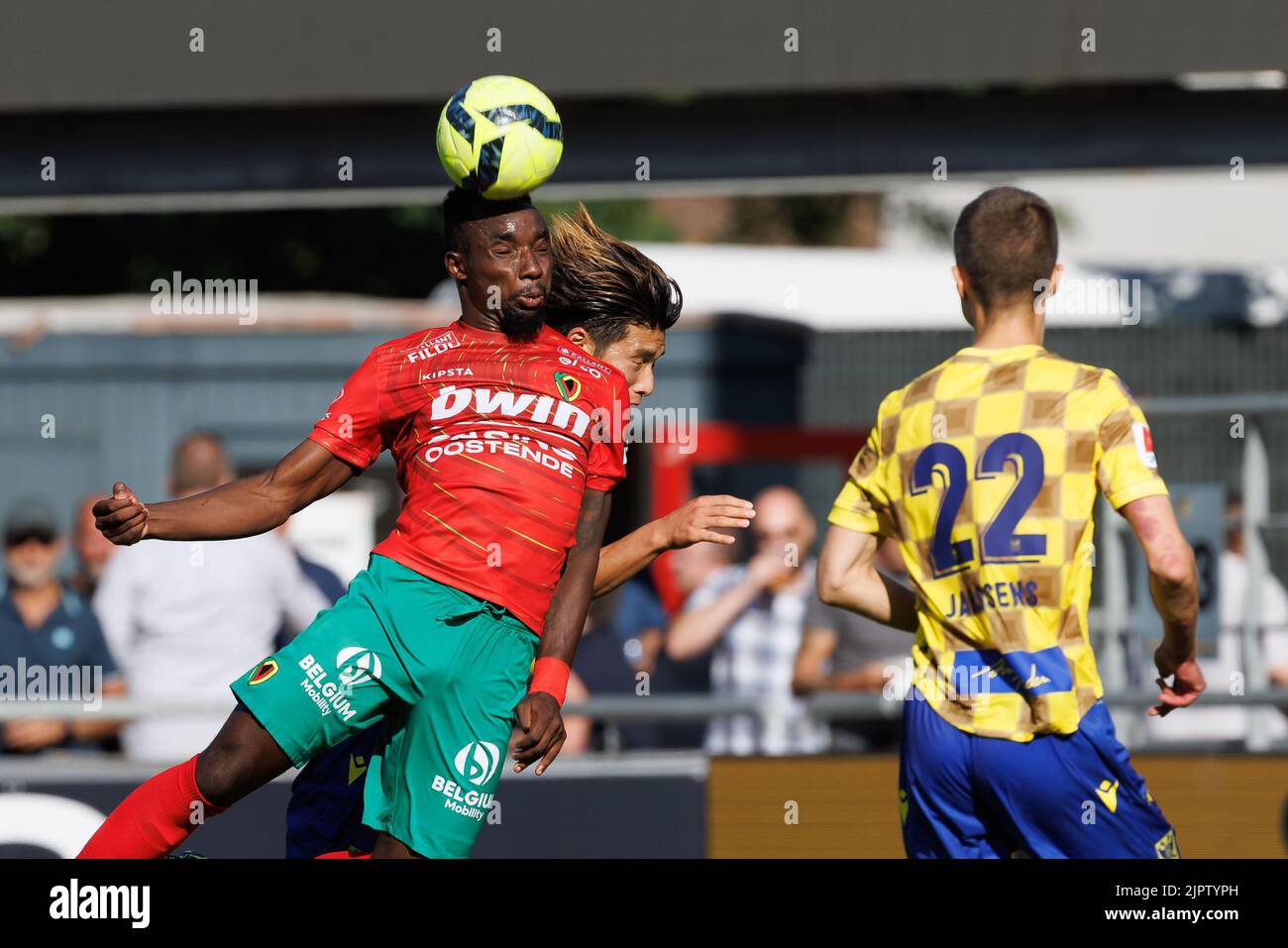 Oostende's Thierry Ambrose and STVV's Daiki Hashioka fight for the ball ...