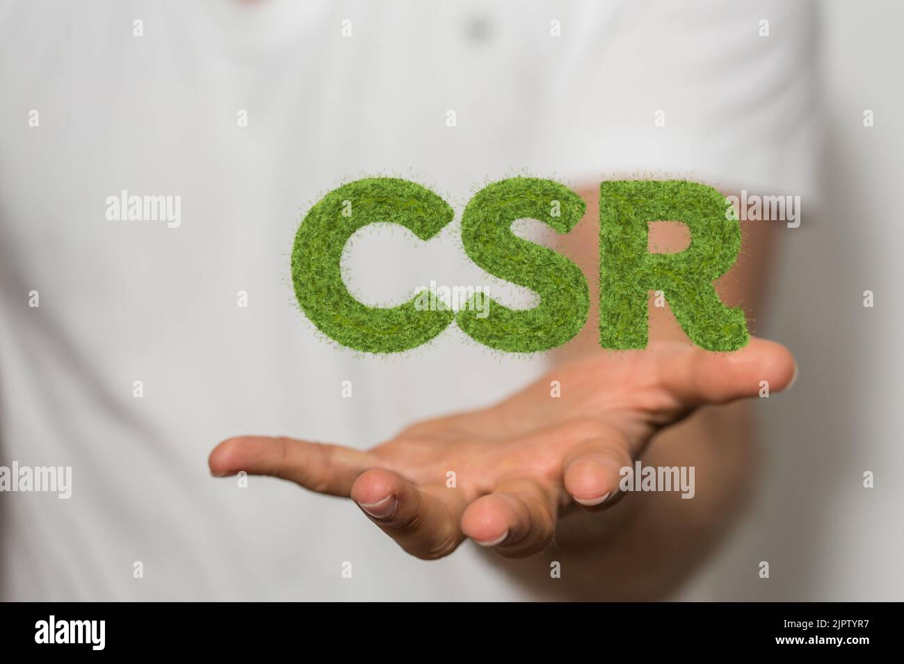 A 3d rendering of floating text "CSR" on a palm of a hand Stock Photo ...