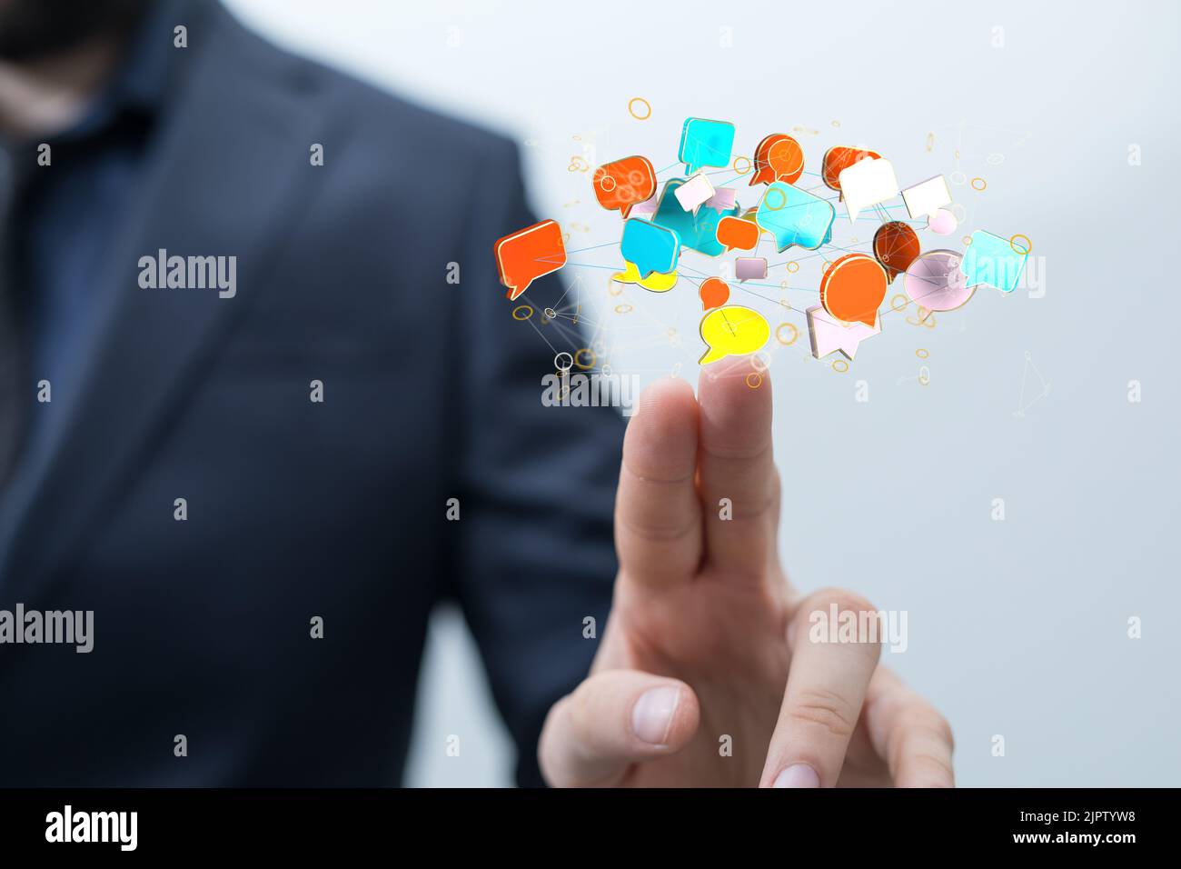A finger touching a 3d rendering of floating connected speak bubbles ...