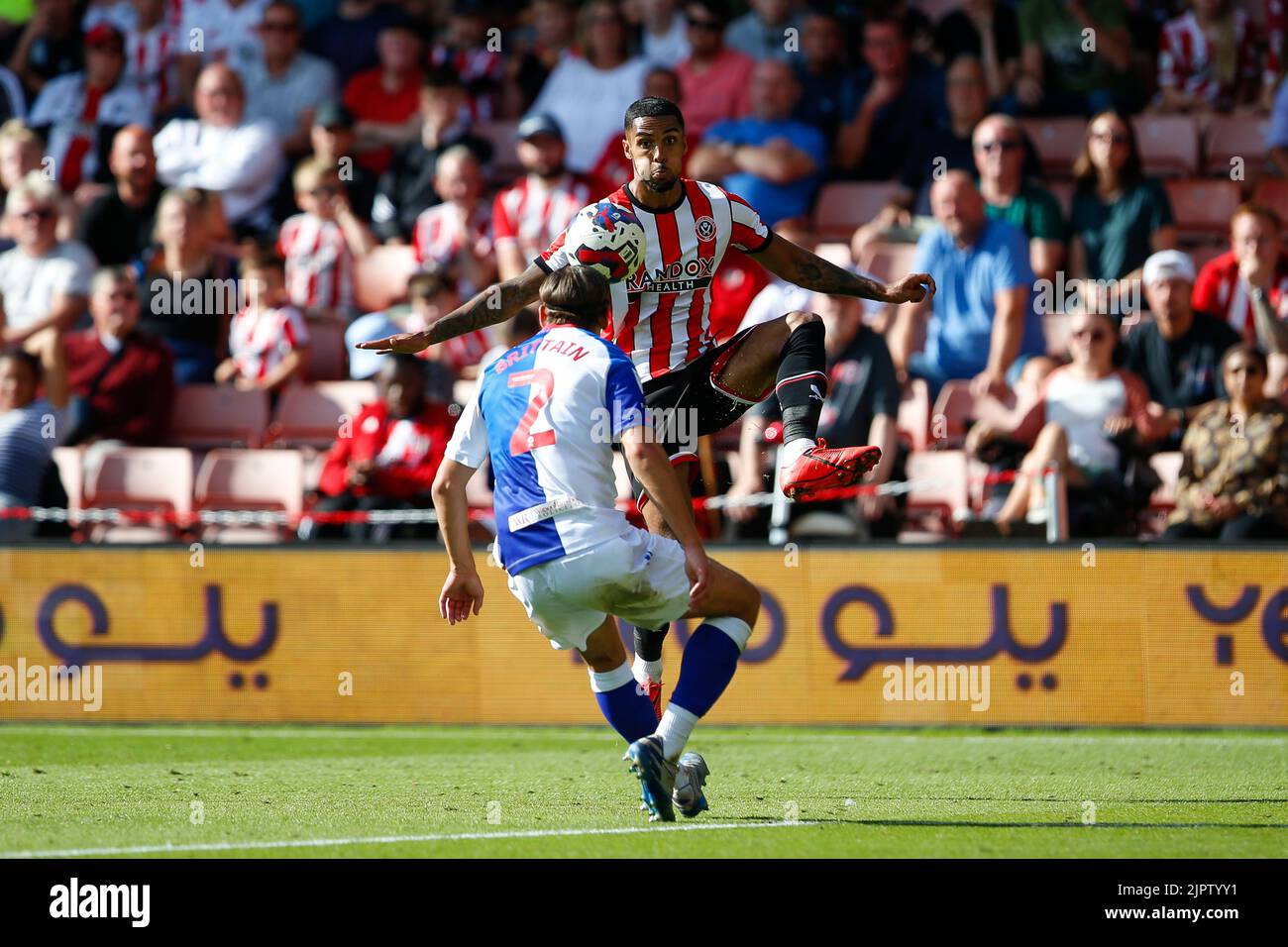 Max Lowe #13 of Sheffield United and Callum Brittain #2 of Blackburn ...