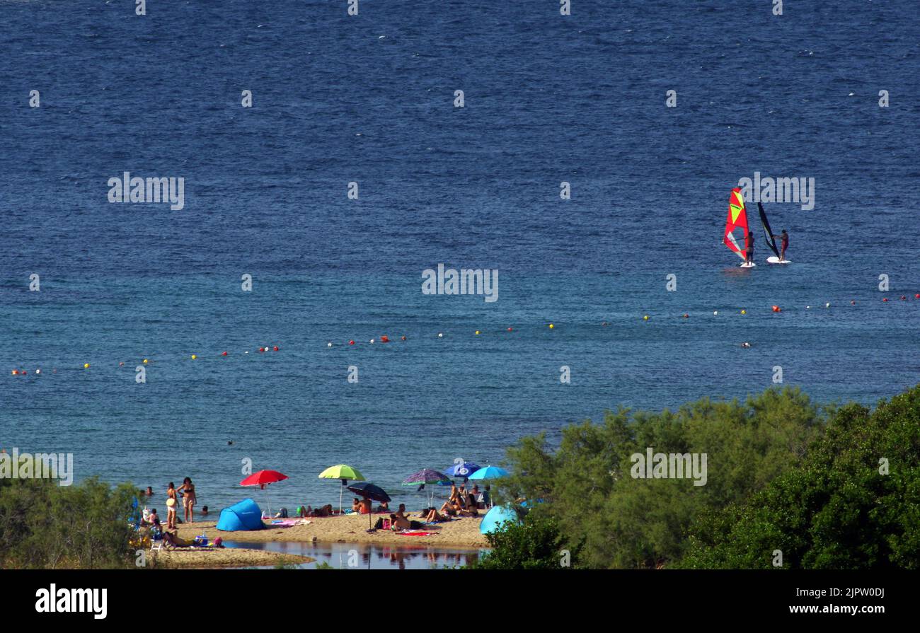 Surfing in front of Sciumara beach, Palau, Sardinia, Italy Stock Photo ...