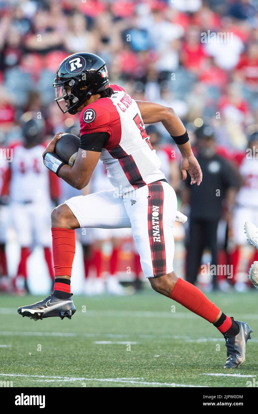 August 19, 2022: Ottawa Redblacks quarterback Caleb Evans (5) runs for ...