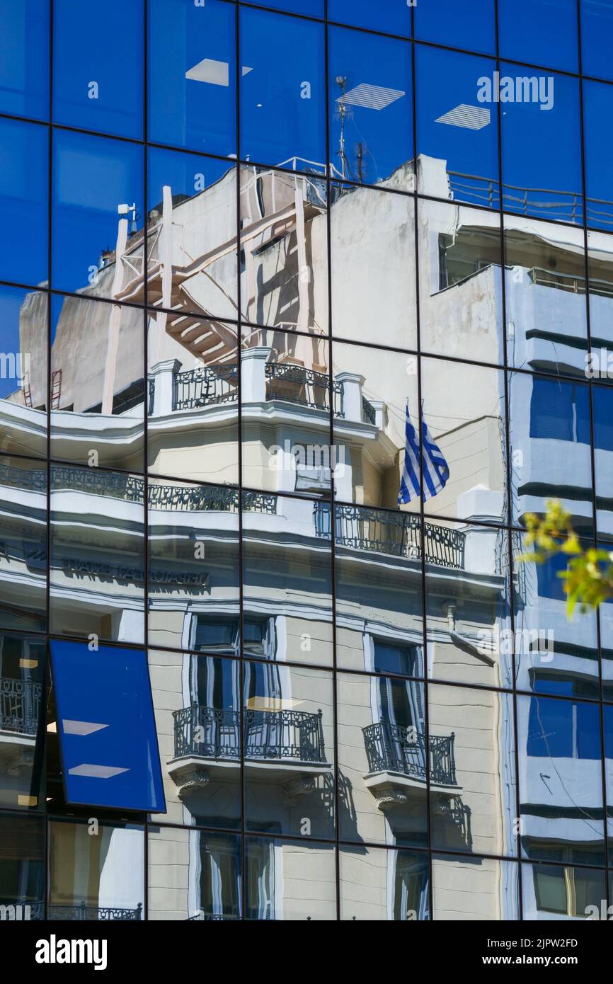 Buildings reflecting themselves in a glass facade, Athens, Attica ...