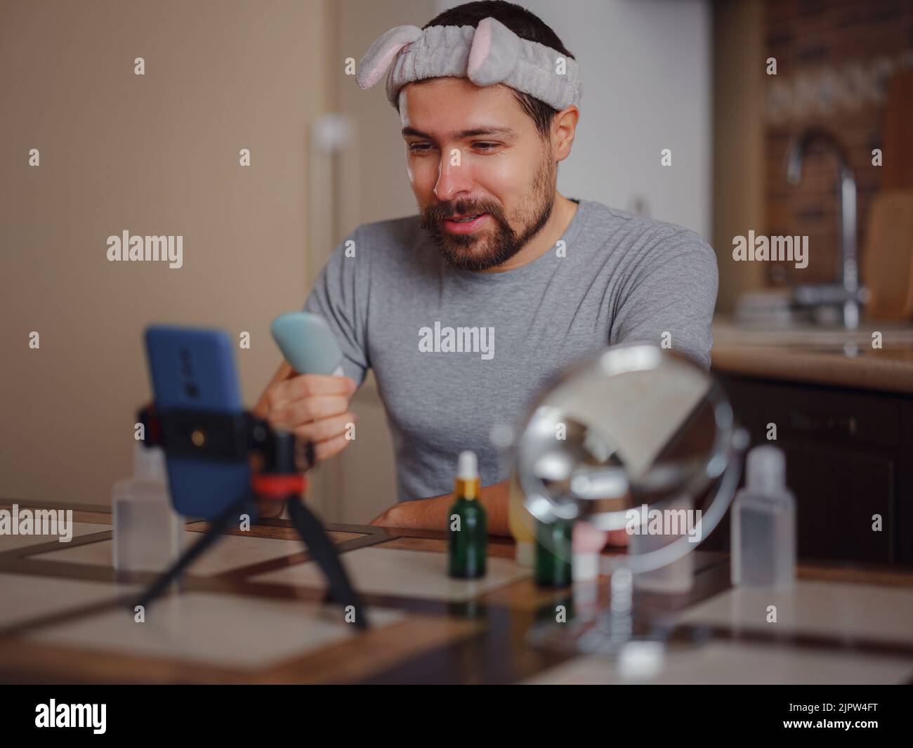 Men's beauty concept. caucAsian guy checking his skin. Beauty blogger ...