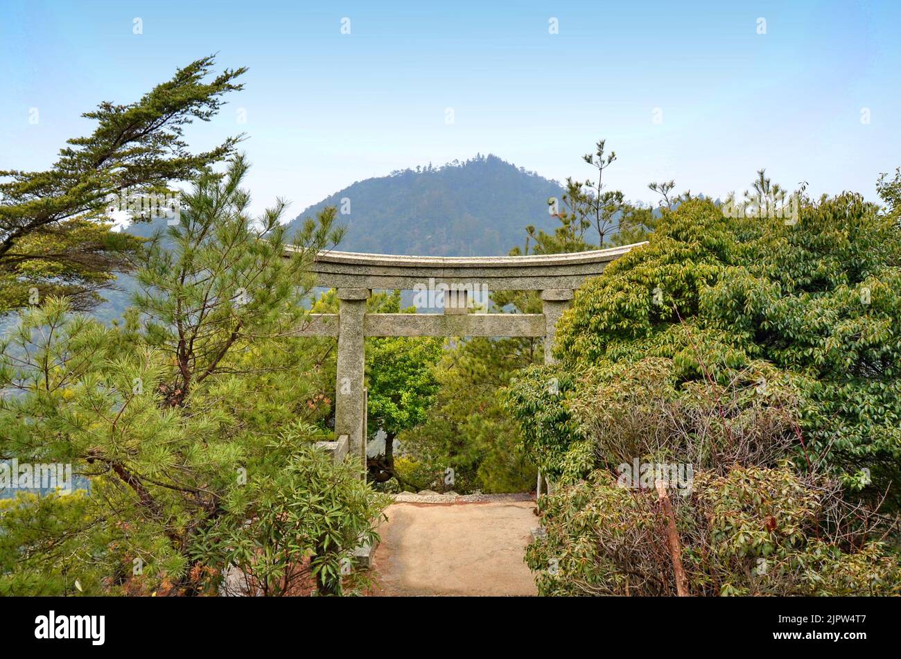 Stone torii gate at Mount Misen, Miyajima island, Hiroshima Prefecture ...