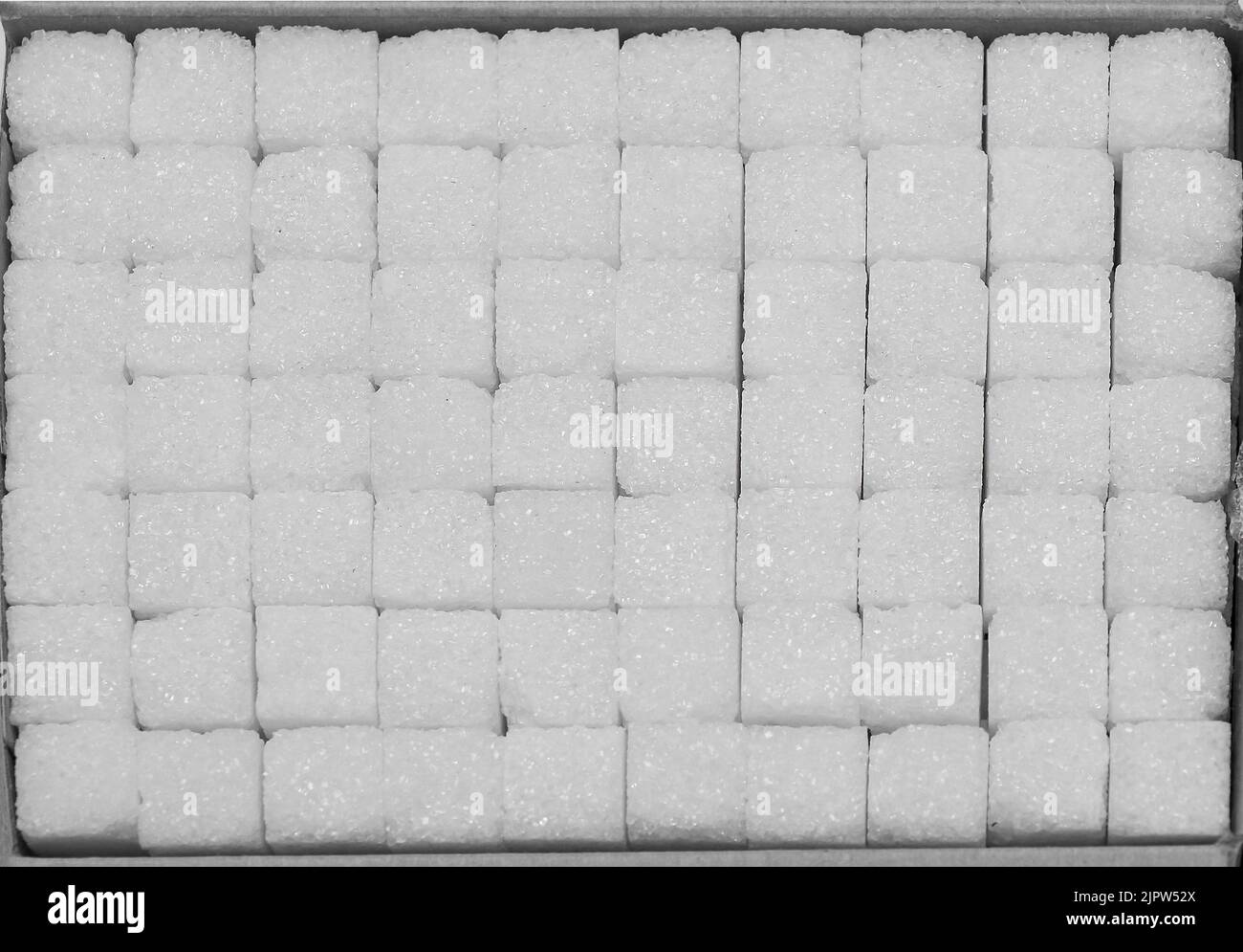 Crystal white sugar cubes texture background detail Stock Photo - Alamy