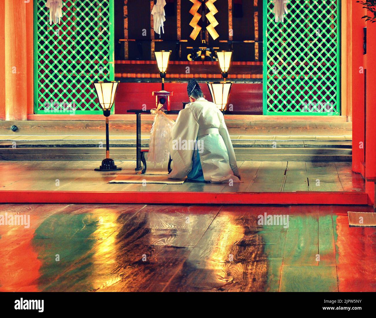 Monk at Itsukushima-jinja, a Shinto shrine in Miyajima island ...