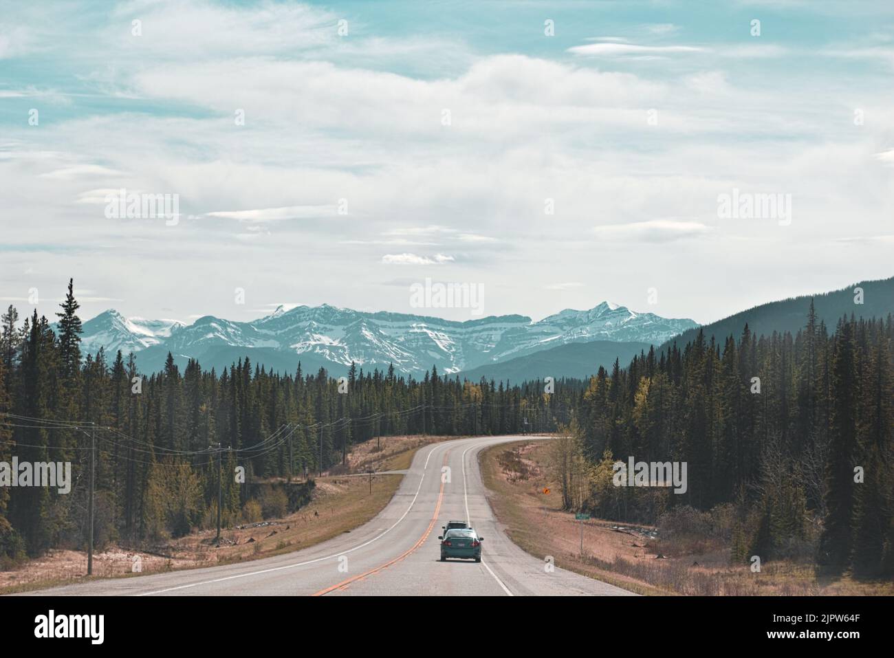 A view of the car driving through the Jasper National Park Mountain ...