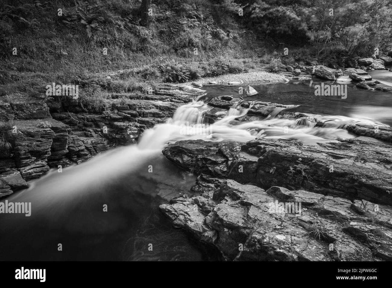 Long exposure of the Watersmeet Bridge waterfall on the East Lyn river ...