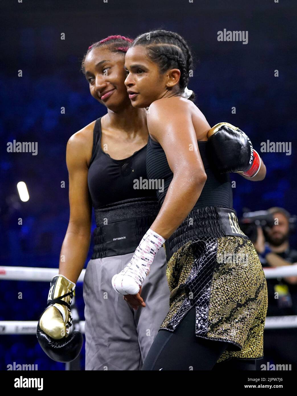 Ramla Ali (right) hugs Crystal Garcia Nova after winning their Super ...