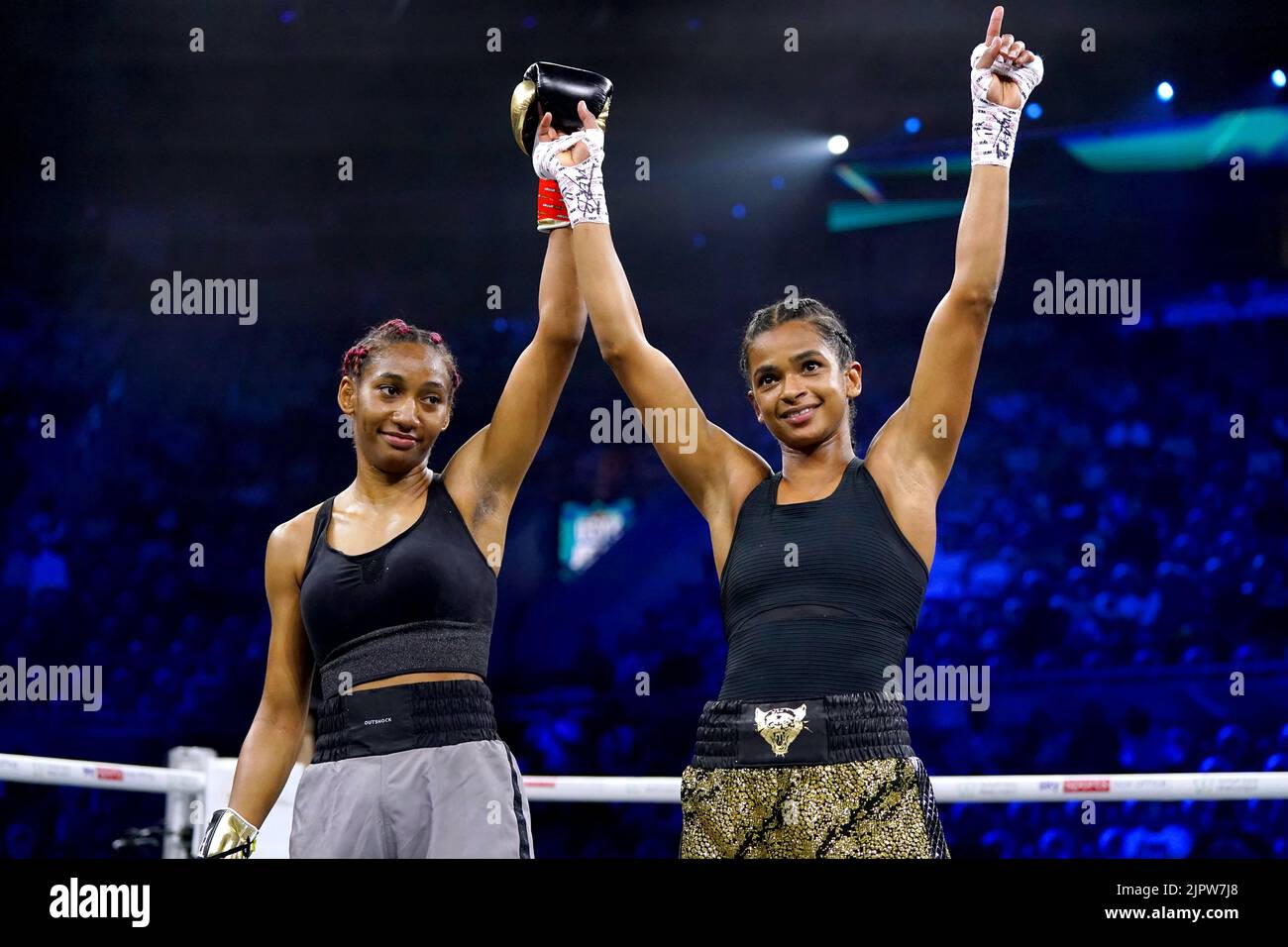 Ramla Ali (right) celebrates after winning her Super Bantam-weight ...