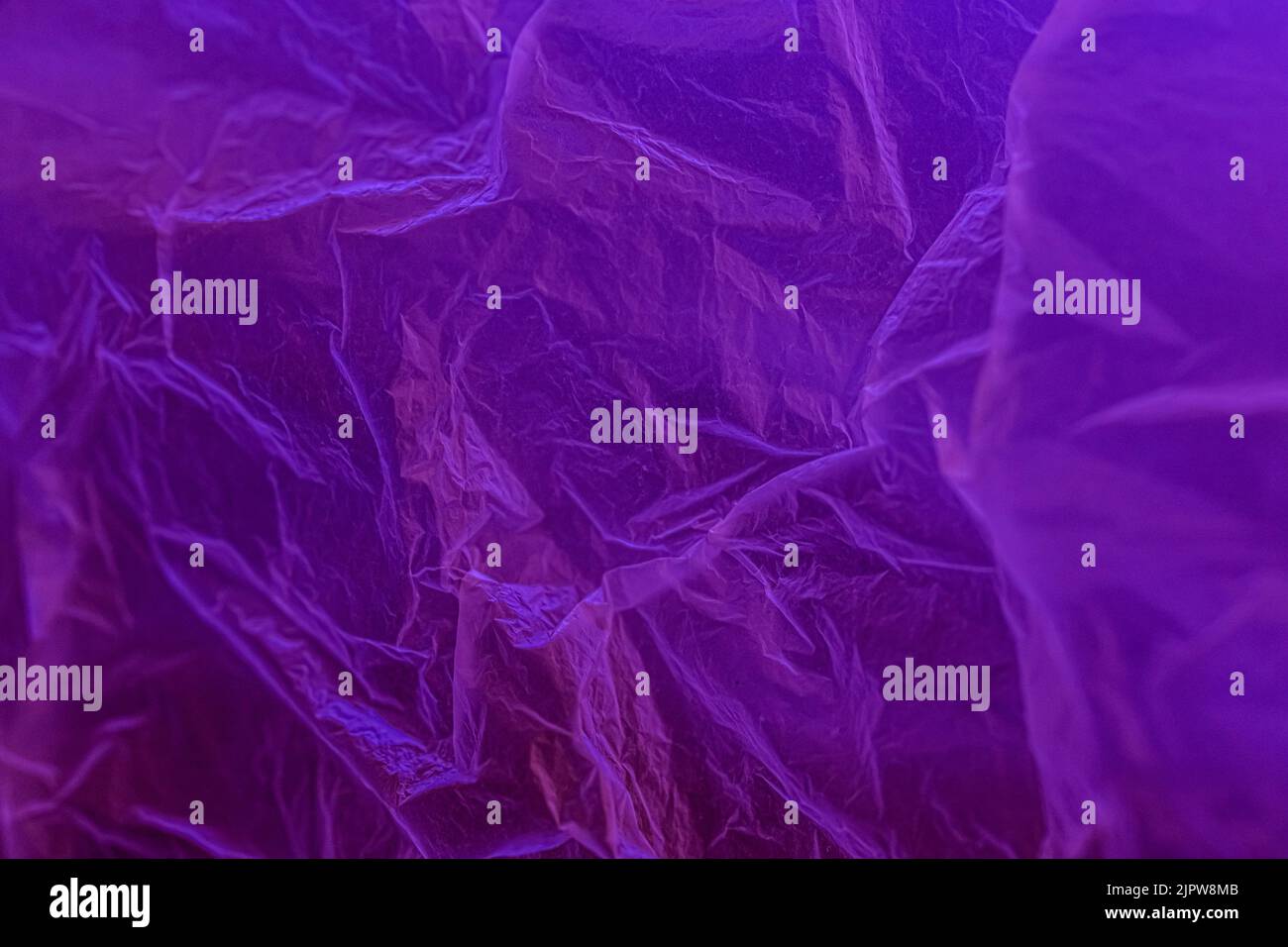 Polyethylene under neon. Plastic texture under ultraviolet light Stock ...