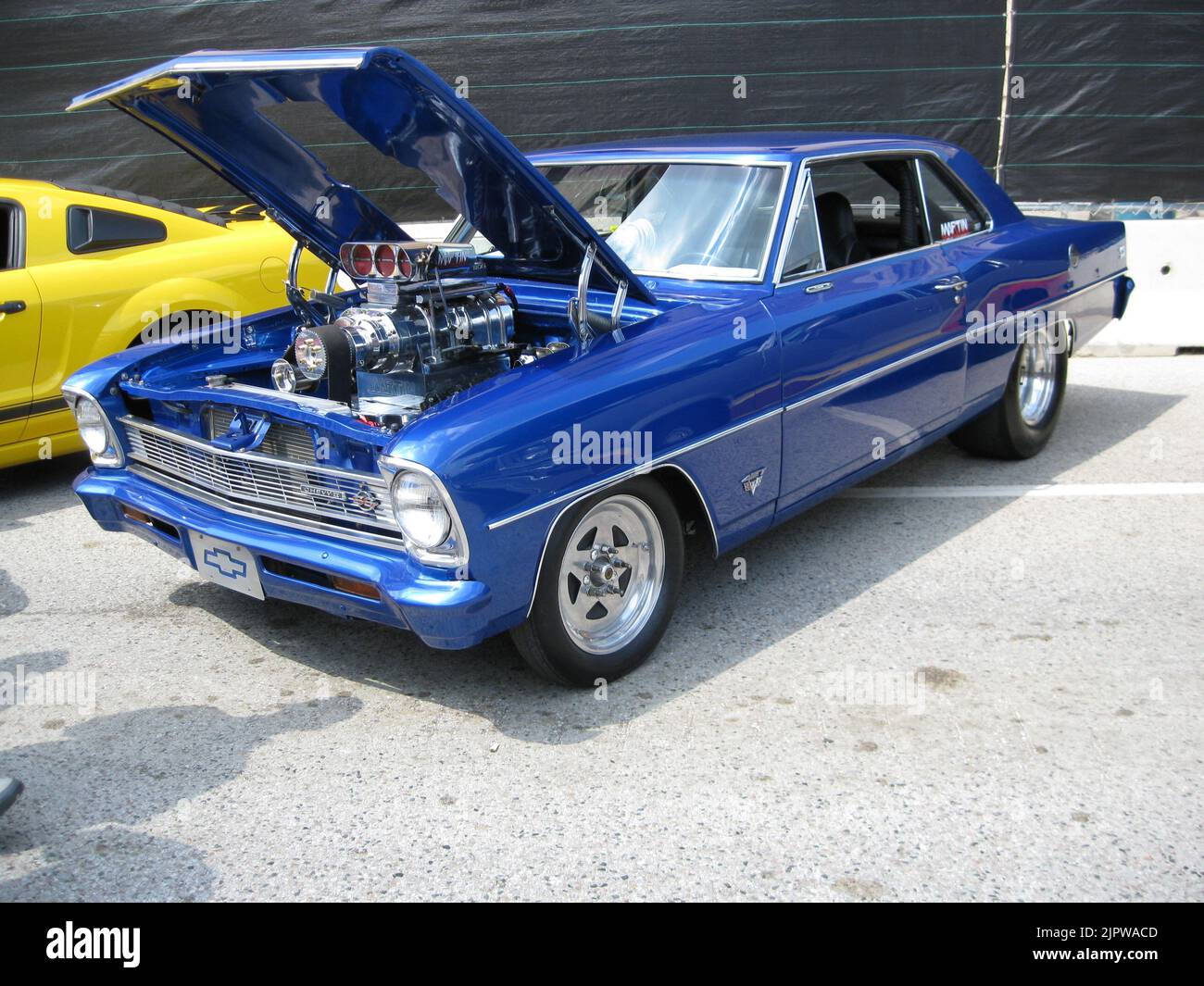 A blue Chevrolet Chevy during Back to the Bricks American classic car ...