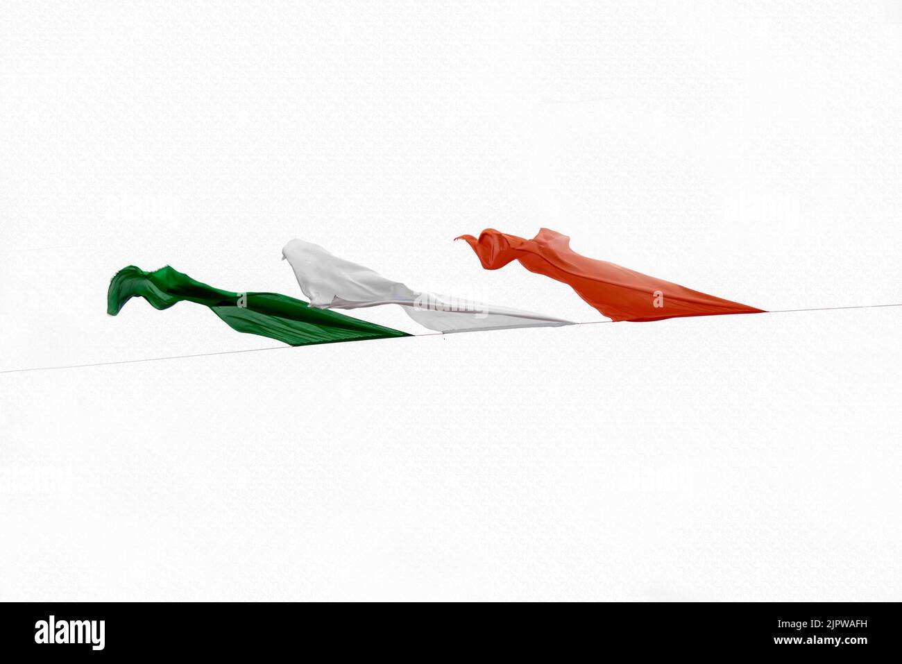 Indian Tricolor cloth are flying against isolated white background ...