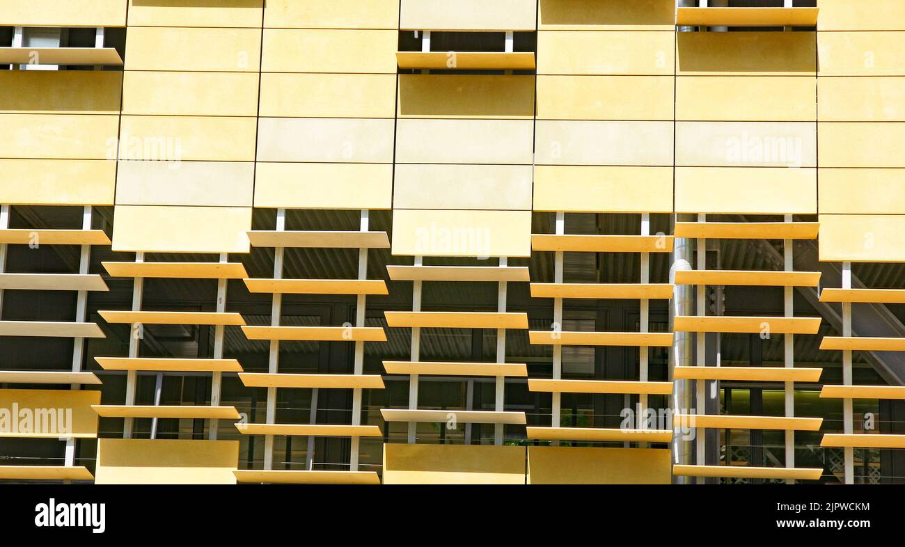 Building covered with glass slats in the New Town of Barcelona ...