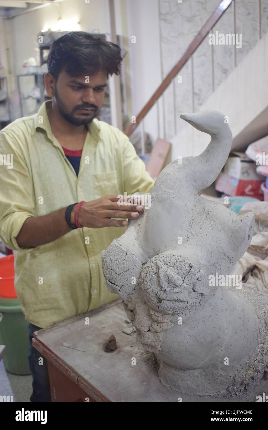 Artist molding clay sculpture hi-res stock photography and images - Alamy