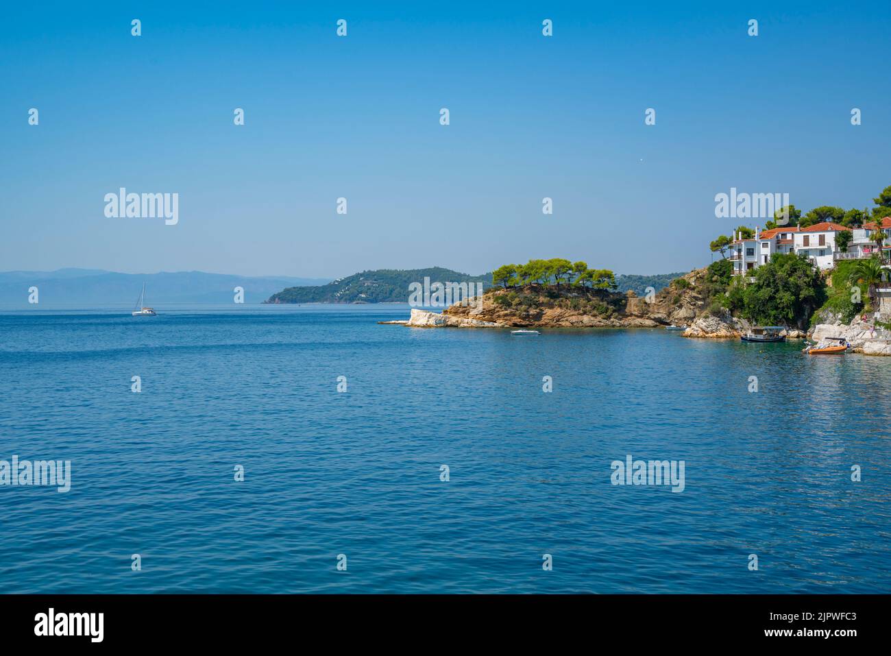 View of sailing ship and Skiathos Town, Skiathos Island, Sporades ...