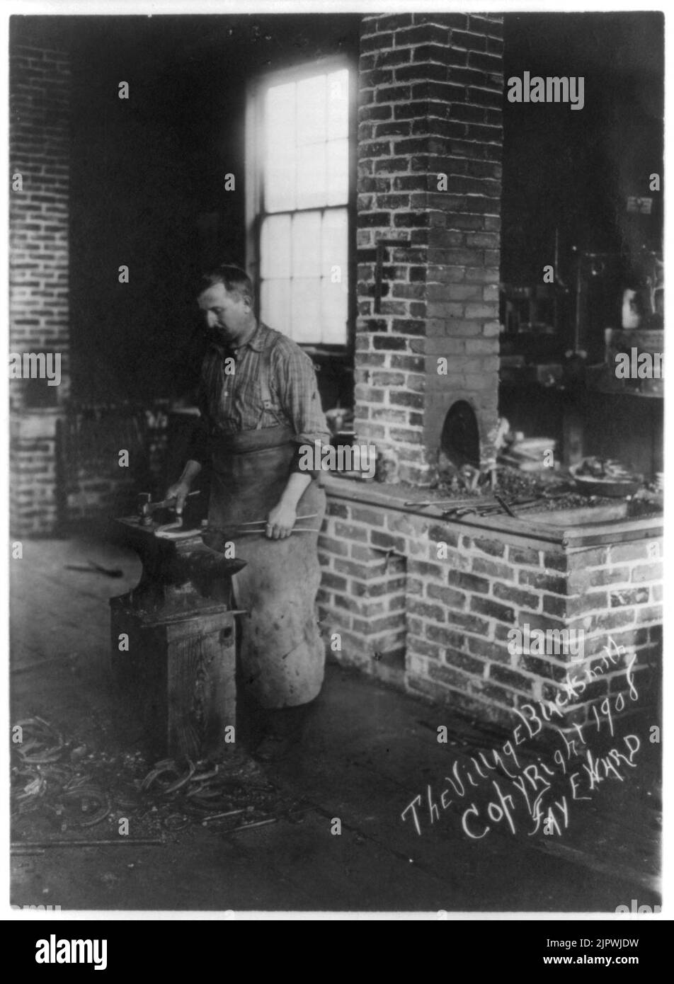 The village blacksmith Stock Photo - Alamy