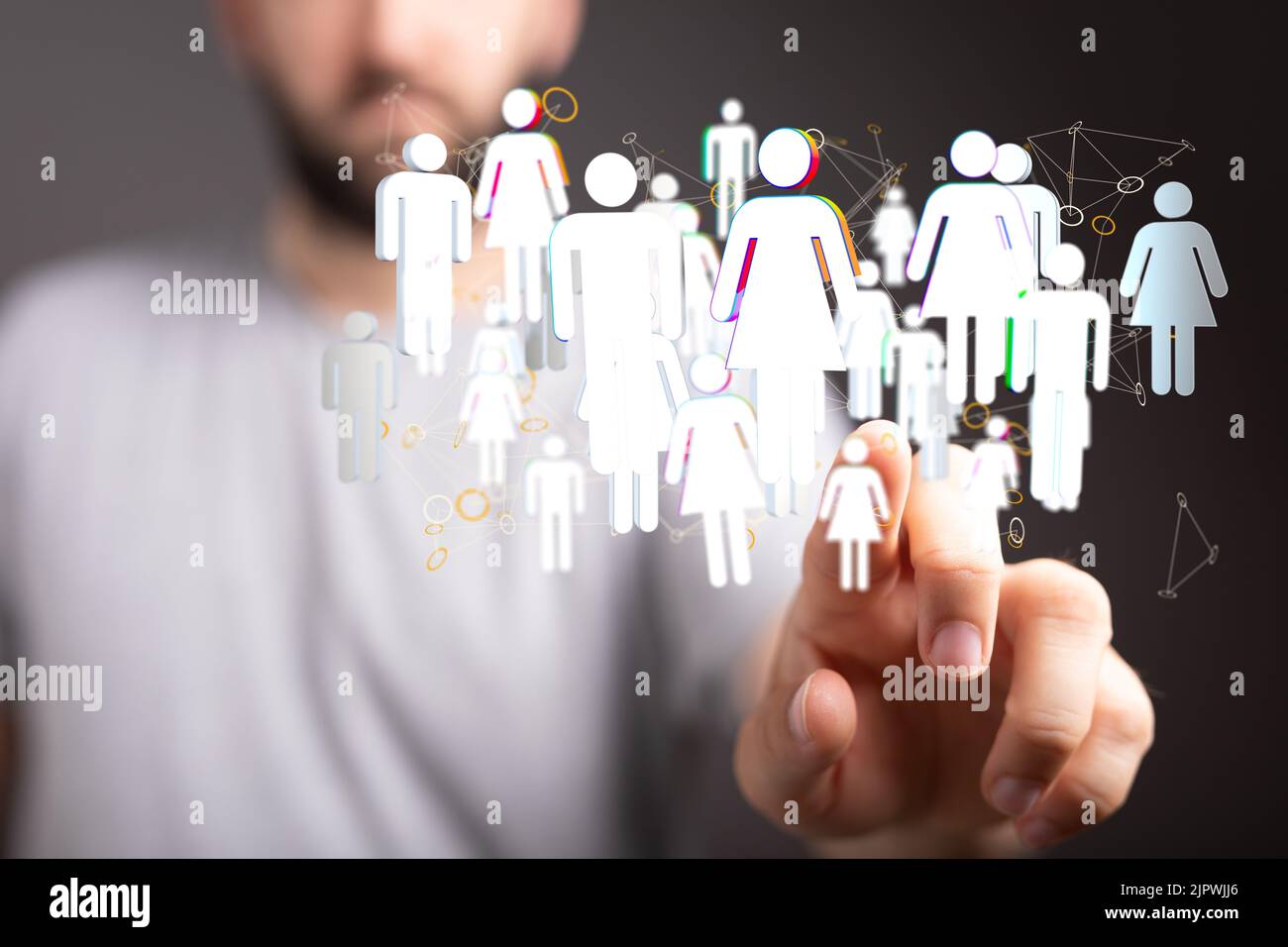 A man pointing at illustrated human figures Stock Photo - Alamy