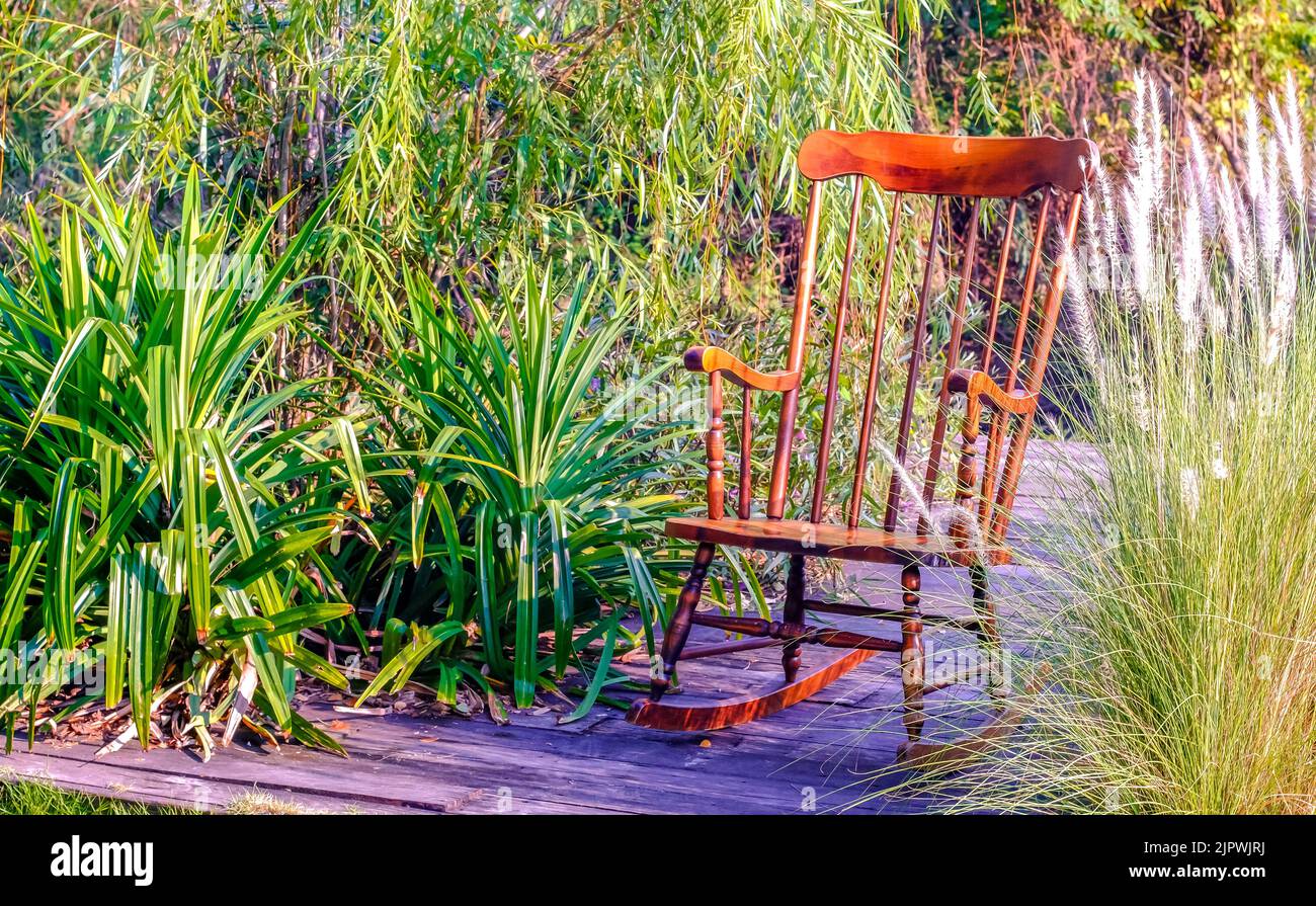 Beautiful garden rocking chair hi-res stock photography and images - Alamy