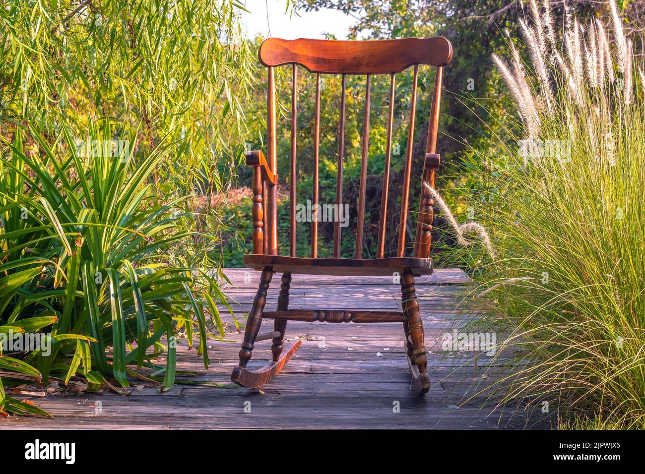 Beautiful garden rocking chair hi-res stock photography and images - Alamy