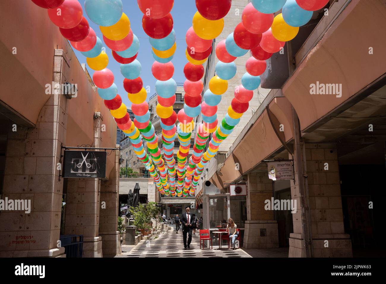 Jerusalem, Israel - June 2nd, 2022: Colorful balloons hanging over a ...