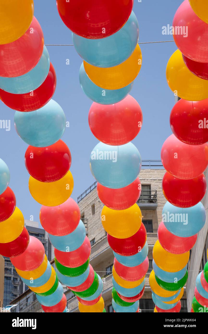 Jerusalem, Israel - June 2nd, 2022: Colorful balloons hanging over a ...