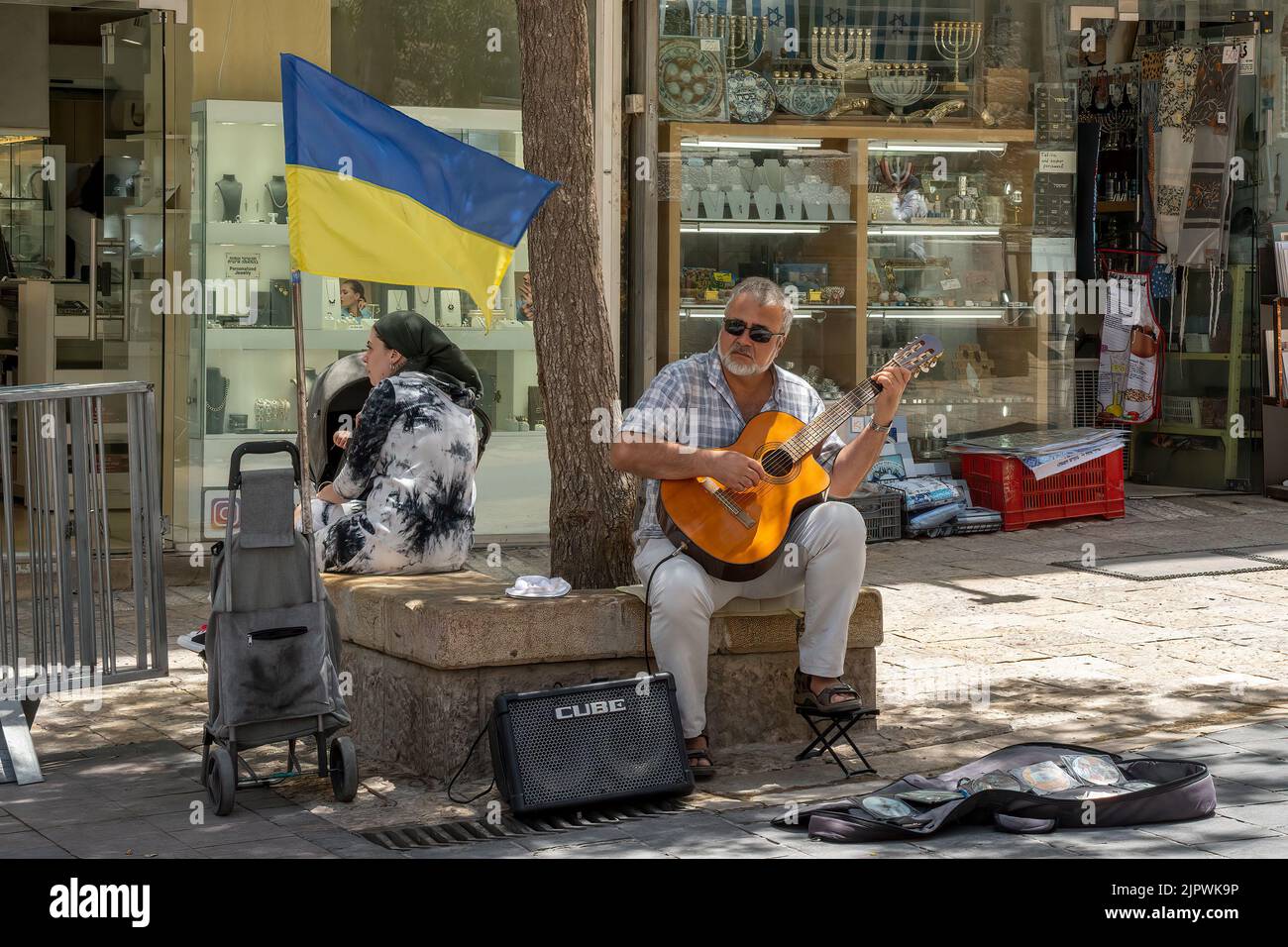 Jerusalem, Israel - June 2nd, 2022: An israeli street musician ...