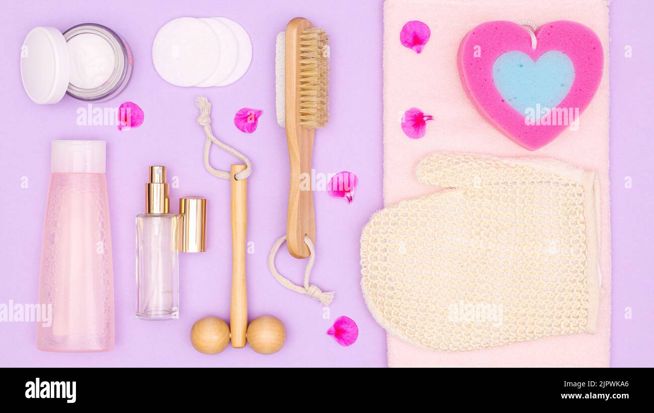 Beauty and cosmetics products pattern on pastel purple background. Spa ...