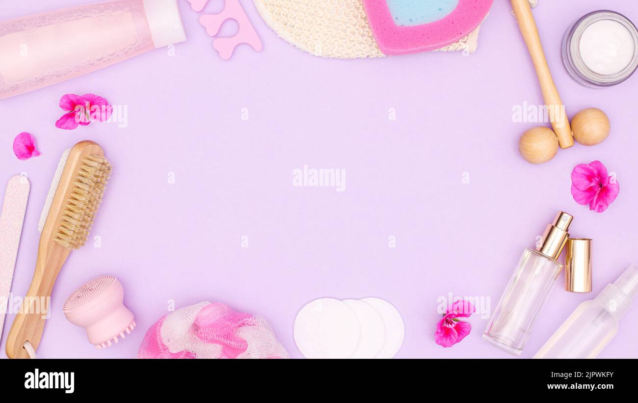 Beauty and cosmetics products on pastel purple background with copy ...
