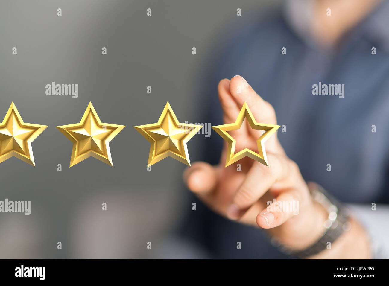A hand reaches for the illustrated star icons, a concept of rating ...