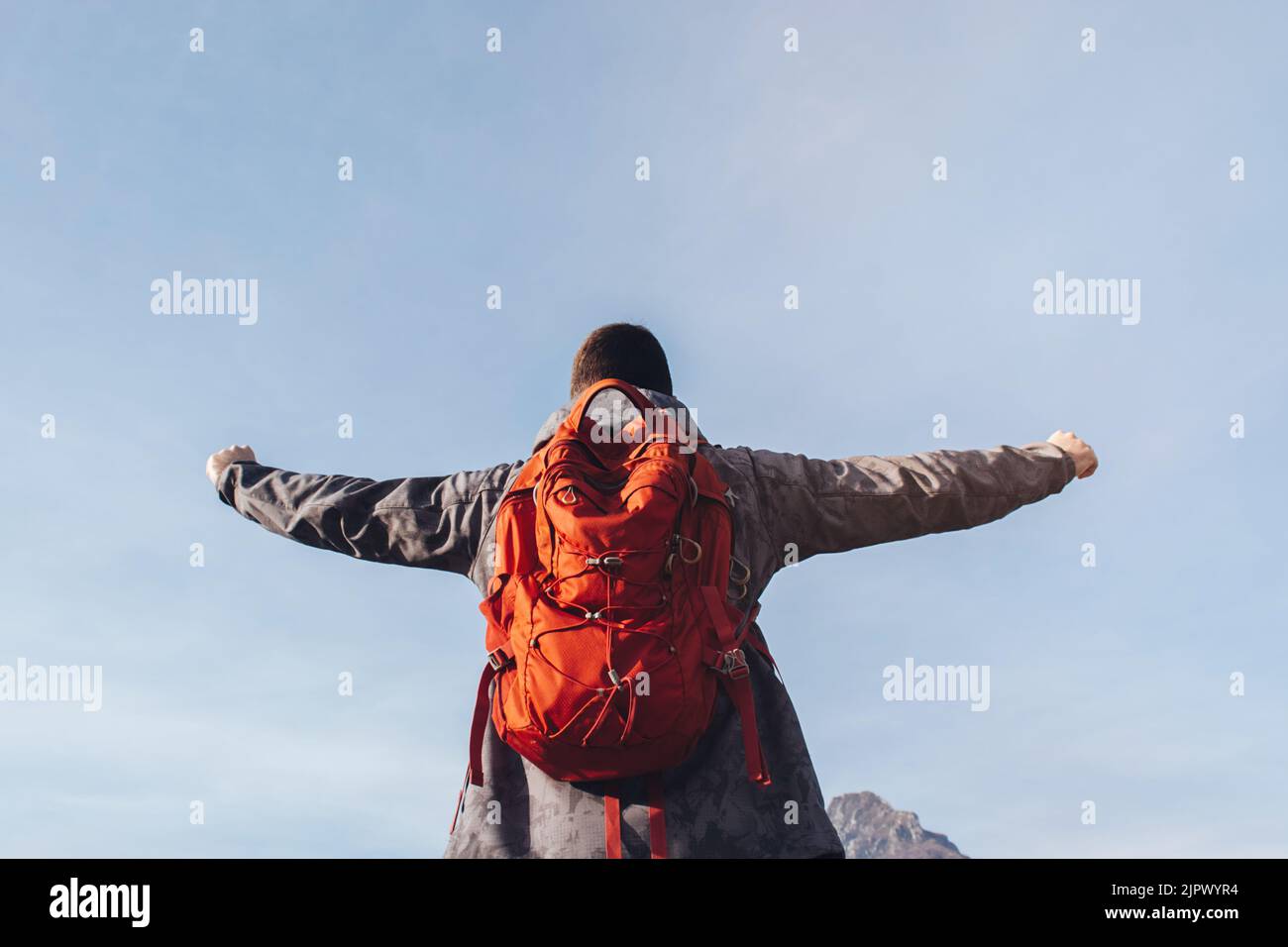 Soft Selective focus Rear view Man-traveler enjoying freedom with ...