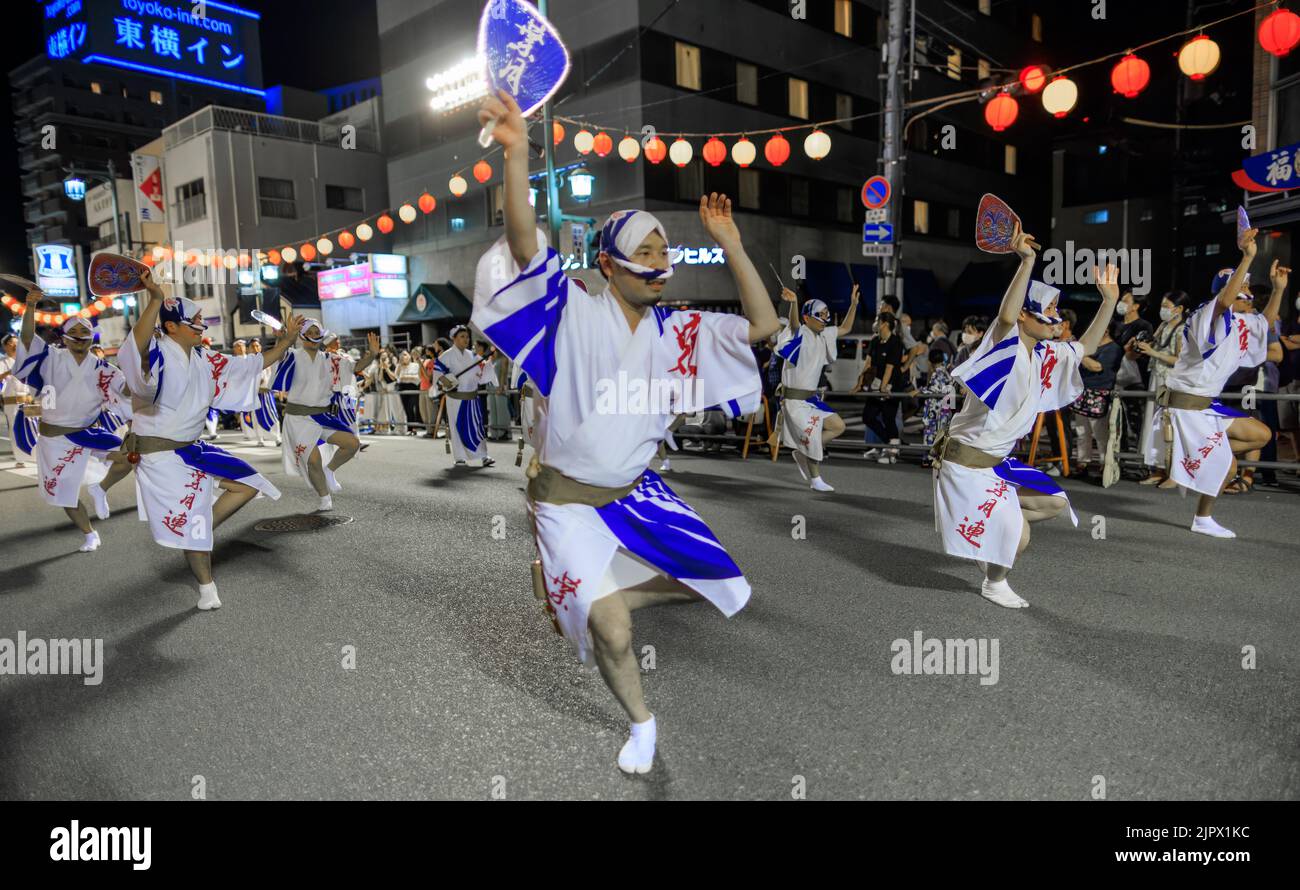 Tokushima, Japan - August 12, 2002: Male dancers perform fan dance at ...