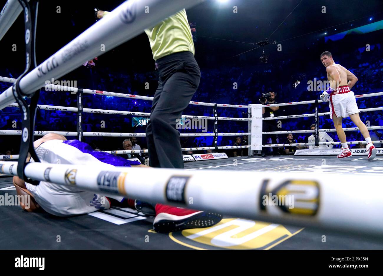 Callum Smith (right) looks around as Mathieu Bauderlique remains down ...