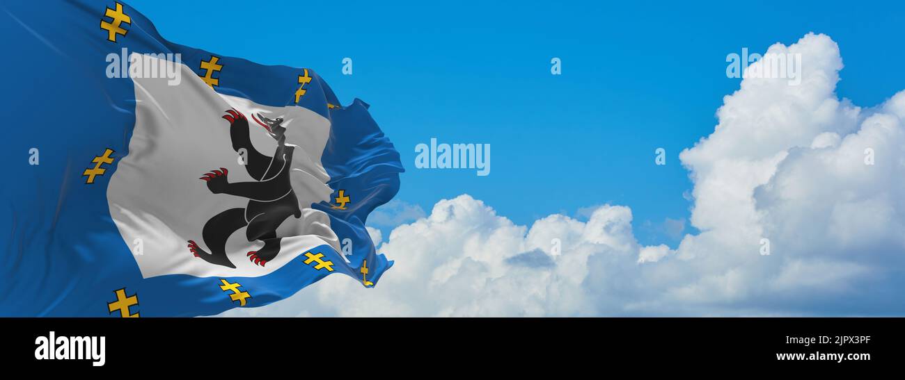official flag of Siauliai County lithuania at cloudy sky background on ...