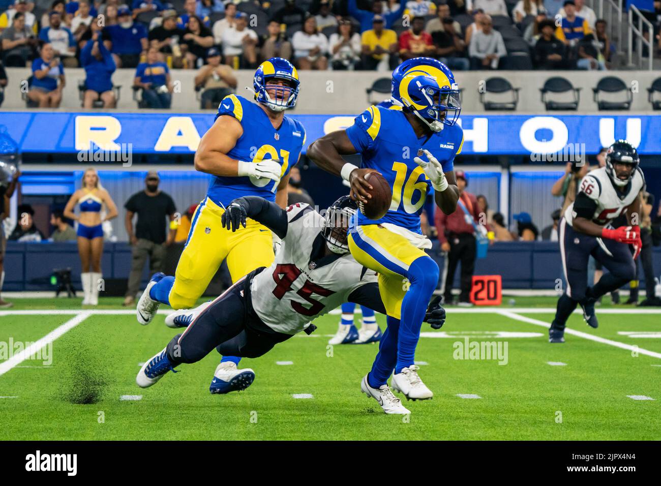 Los Angeles Rams quarterback Bryce Perkins (16) gets away from Houston ...