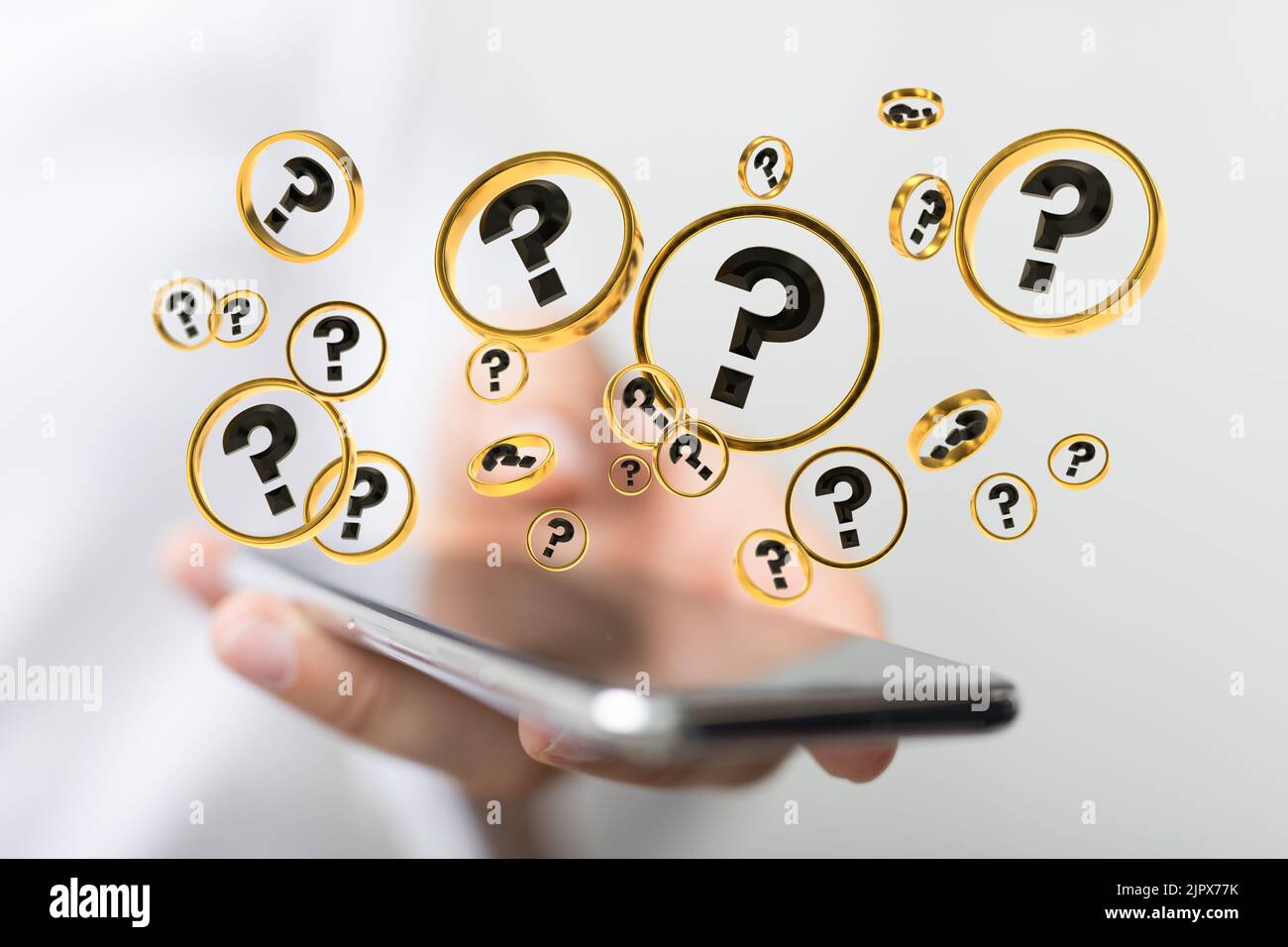 A 3D rendering of question mark icons floating above a phone in a person's hand Stock Photo - Alamy