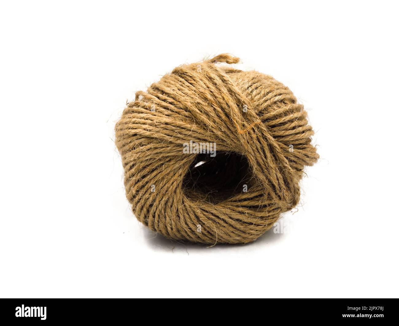brown yarn isolated with white background Stock Photo - Alamy