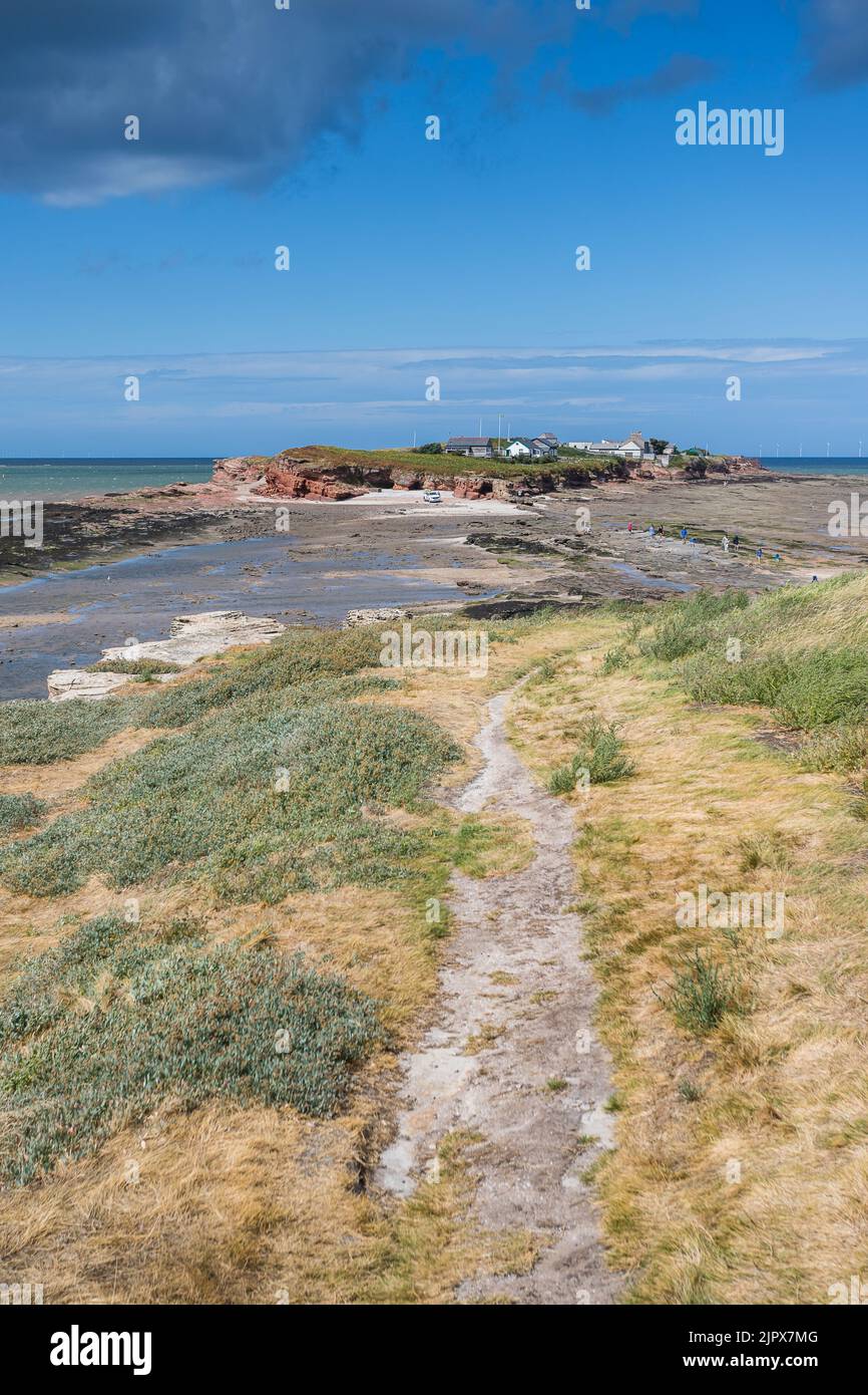 A pathway descends down the edge of Middle Eye leading hikers to Hilbre ...