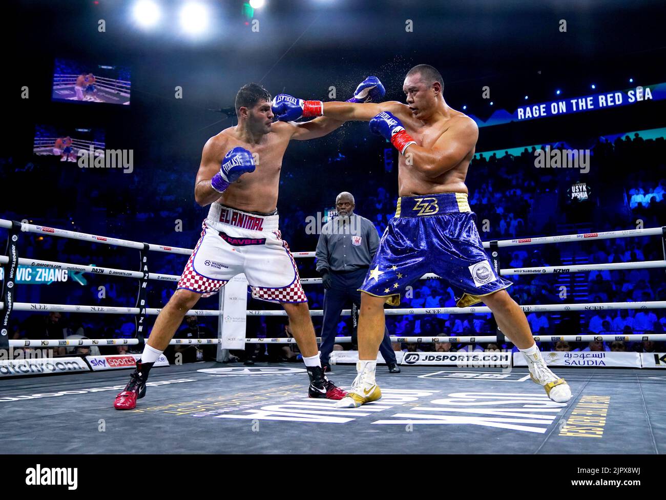 Filip Hrgovic (left) in action against Zhang Zhilei during their Final ...