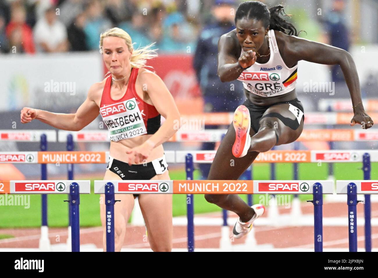 Belgian athlete Anne Zagre runs to win her heat during the heats of the ...