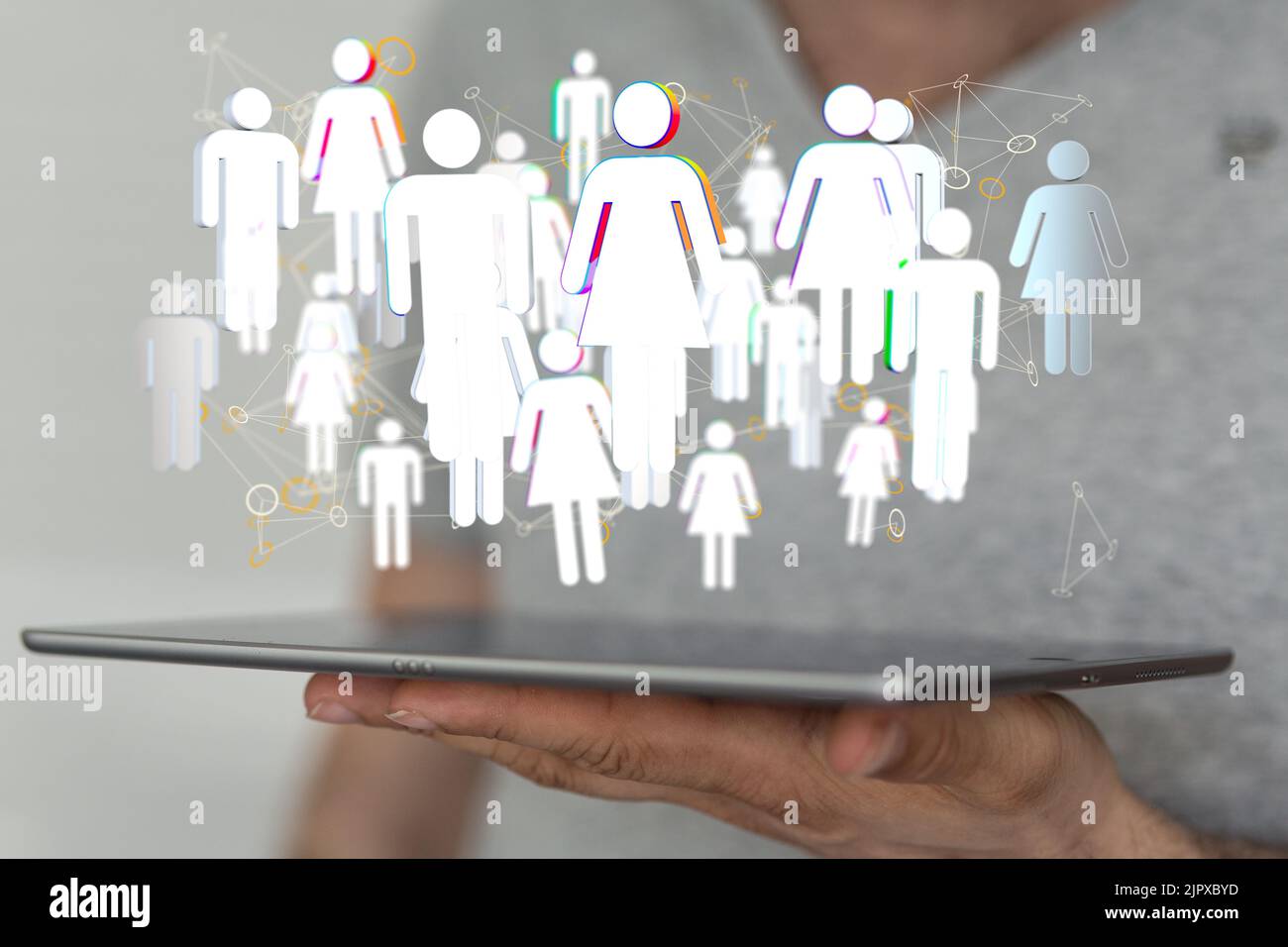 A 3d render of many of online users on a tablet in a hand Stock Photo ...