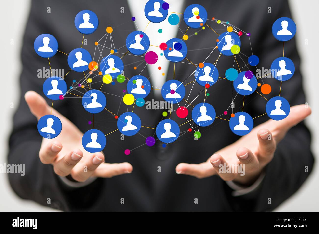 A person's hands interacting with many of online users connecting, 3d ...