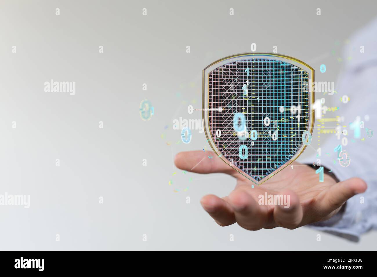 A 3D rendered security shield floating above a hand Stock Photo - Alamy
