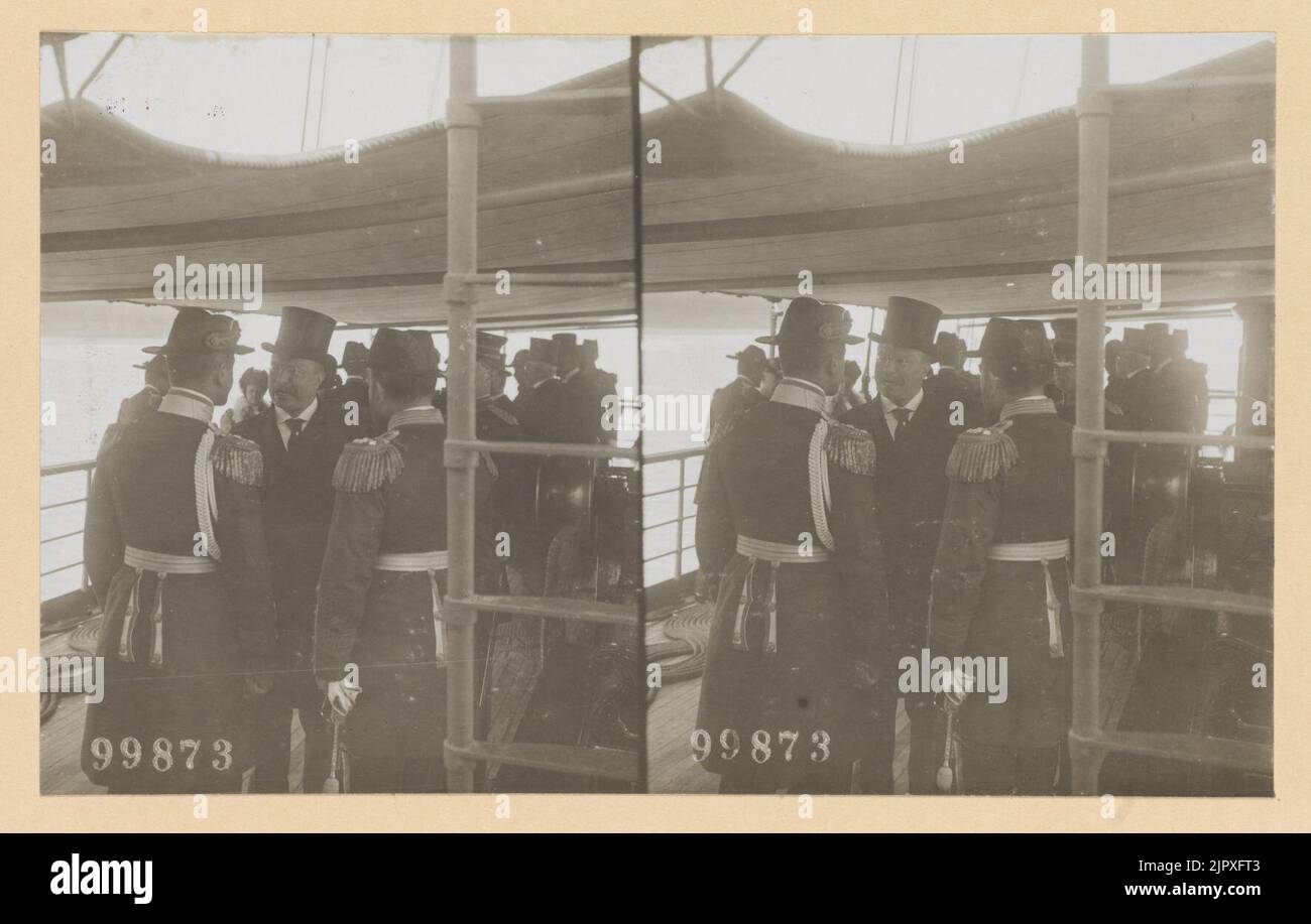 Theodore Roosevelt conversing with two naval officers on deck of ship ...