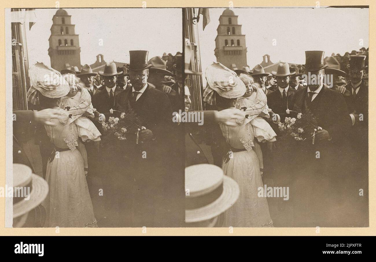 Theodore Roosevelt holding bouquet at an unidentified event, a woman ...