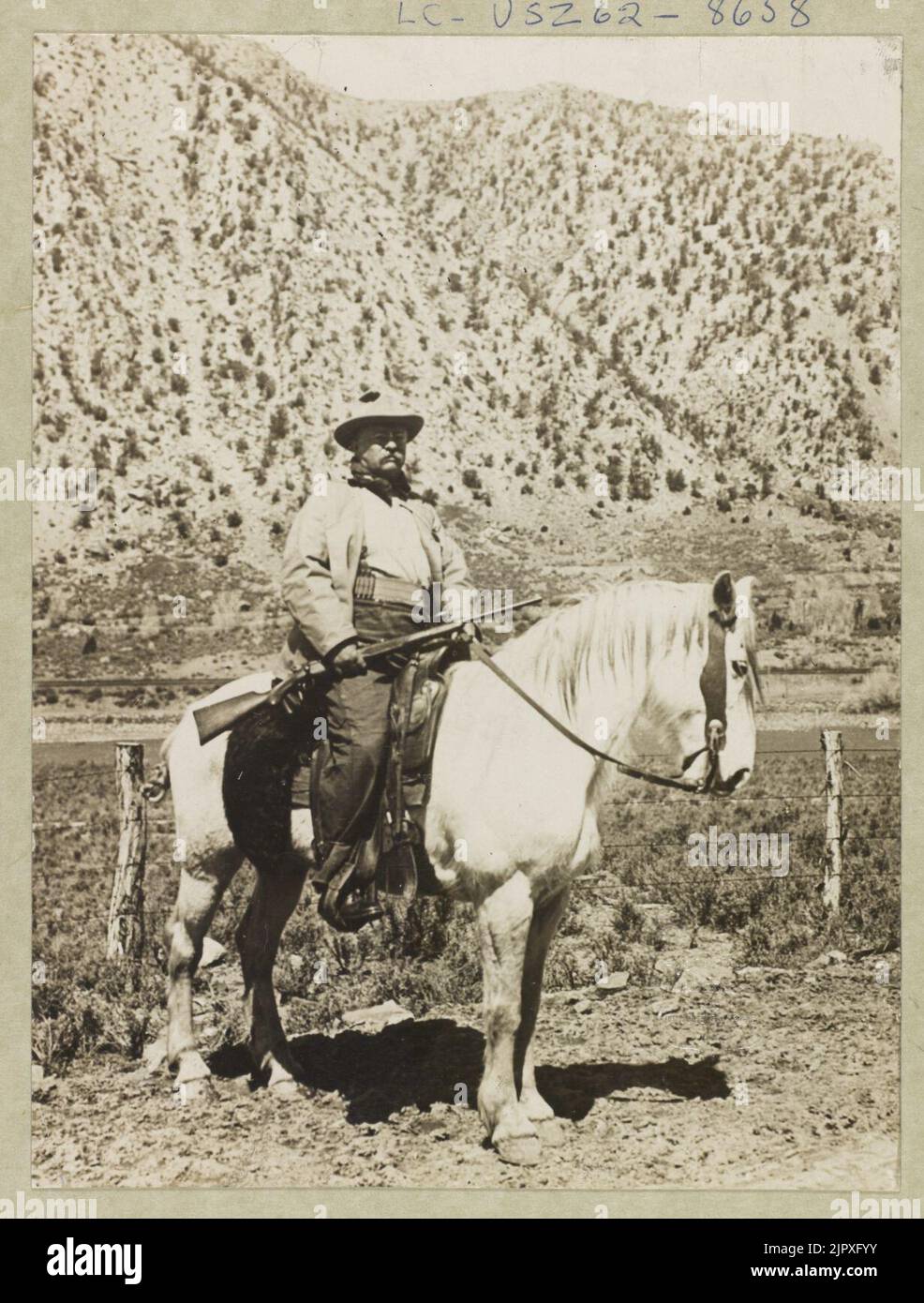 Theodore Roosevelt on horseback carrying rifle Stock Photo - Alamy