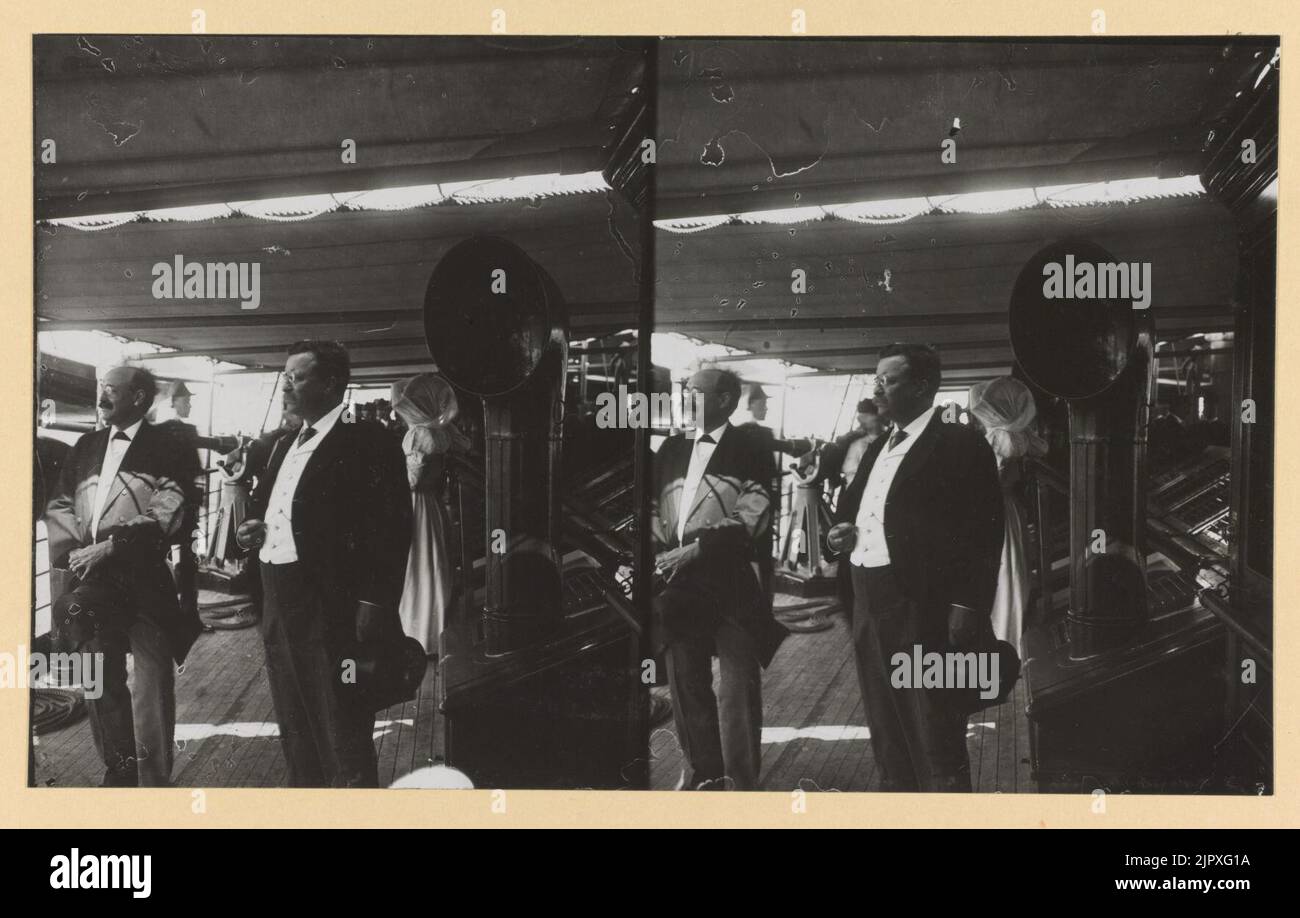 Theodore Roosevelt on deck of ship with another man, facing left Stock ...